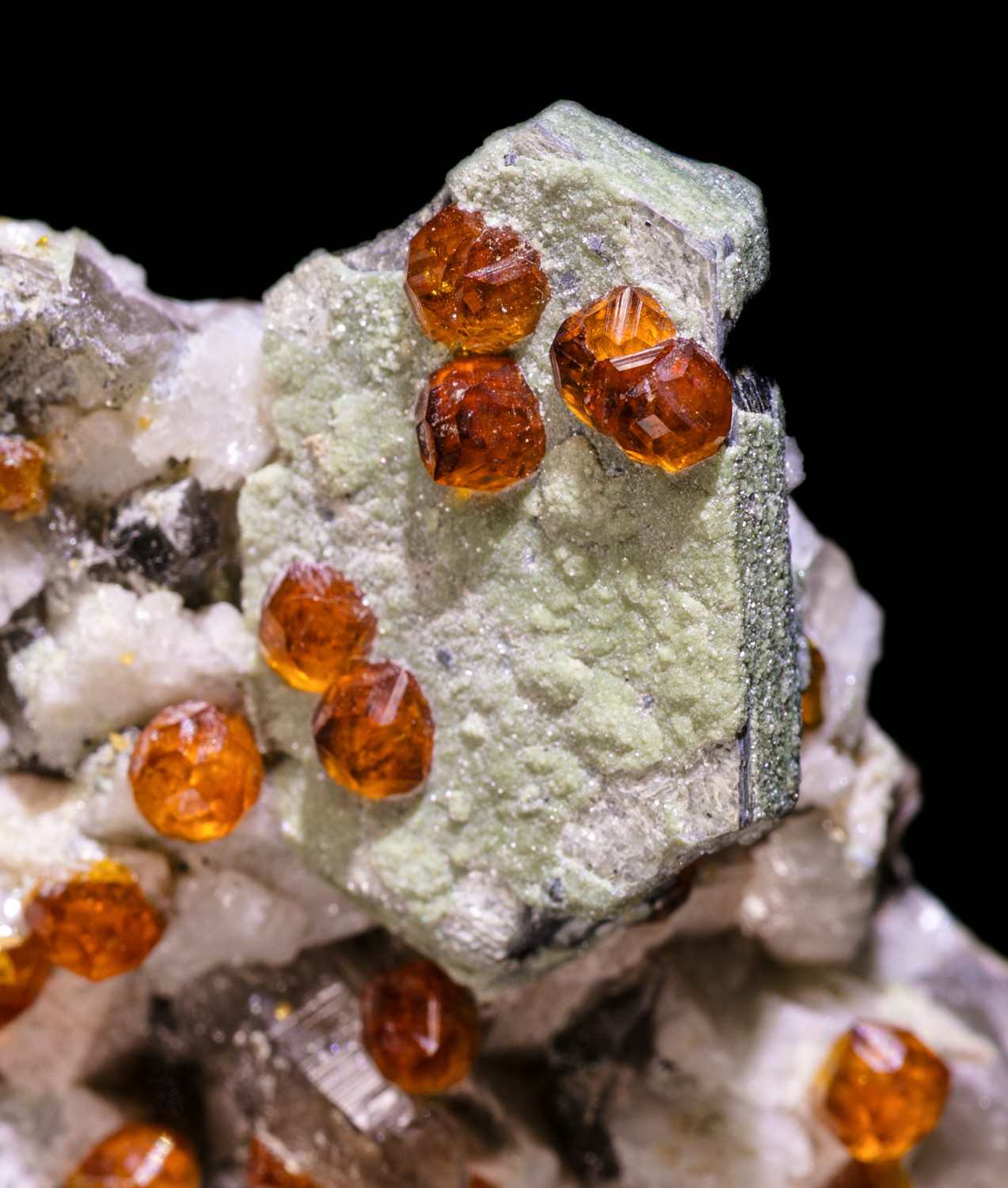 Spessartine on Muscovite and Feldspar | Wushan Spessartine Mine, Tongbei, Yunxiao Co., Fujian, China